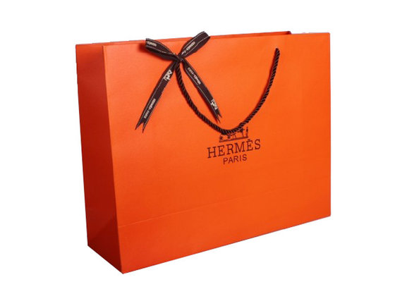 Elegant Orange Color Branded Paper Bag Logo Printed Cord Handle With Bow