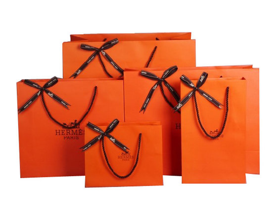 Elegant Orange Color Branded Paper Bag Logo Printed Cord Handle With Bow