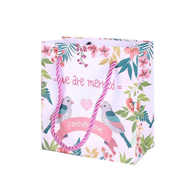 China Low cost wedding gift packaging paper bag logo print cash on sale customsied supplier