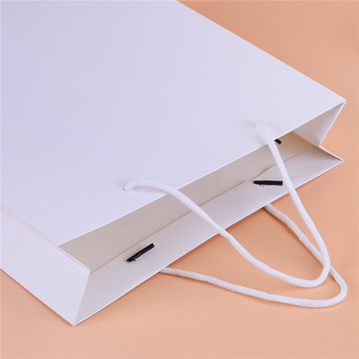 Pure white clothes packaging paper bag accept personal logo printing supplier