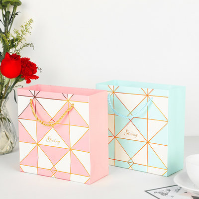 OEM men's business suit gift paper packaging white paper bag with handle supplier