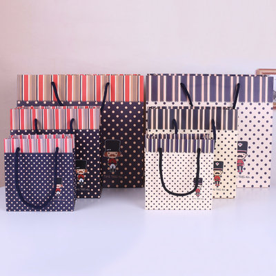 Customised cheap paper bag for children's clothing packaging shopping bags supplier