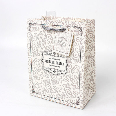 Vintage design jewelry packaging paper bag own logo printing rope handle supplier