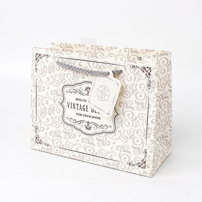 Vintage design jewelry packaging paper bag own logo printing rope handle supplier