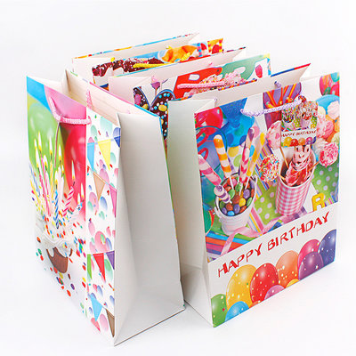 Custom paper shopping bags logo coated birthday present paper bag supplier