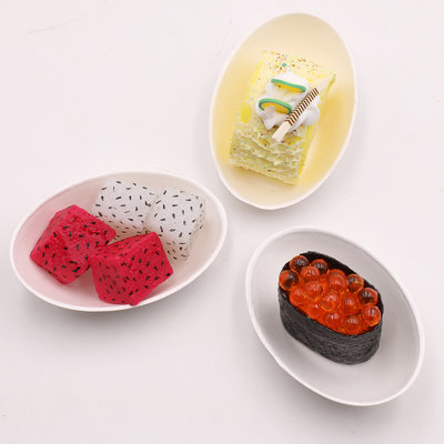 Oval biodegradable egg shape sugarcane fruit dish disposable bagasse paper fish tray supplier