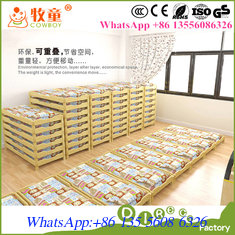 China Guangzhou China Manufacturer Kids Child Care Wooden Stackable Beds for Kindergarten supplier