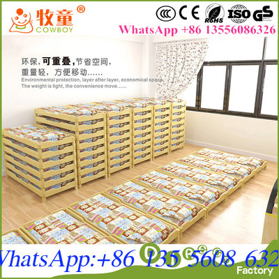 Guangzhou China Manufacturer Kids Child Care Wooden Stackable Beds for Kindergarten supplier