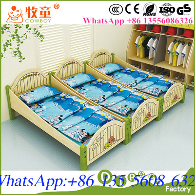 Guangzhou China Manufacturer Kids Child Care Wooden Stackable Beds for Kindergarten supplier