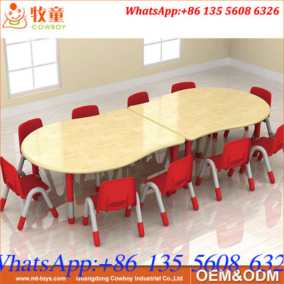 Day Care Centre High Quality 4 Seats Round Wood Table and Plastic Chairs for 2-5 years old kids supplier