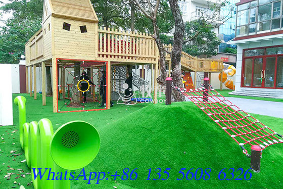 Kindergarten wooden tree house outdoor playground equipment with climbing net supplier