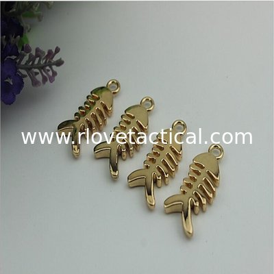 Small light gold fish bones pattern zinc alloy metal handbag logo label tags for sales