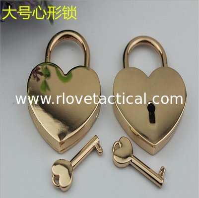 Fashion hardware handbag light gold decorative zinc alloy hanging heart shaped concentric lock for sales