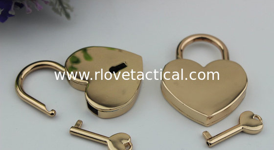 Fashion hardware handbag light gold decorative zinc alloy hanging heart shaped concentric lock for sales
