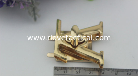 High polished zinc alloy gold plated V letters handbag twist lock