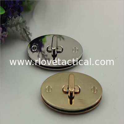 New arrival zinc alloy gold color oval type fashion wild handbag twist locks