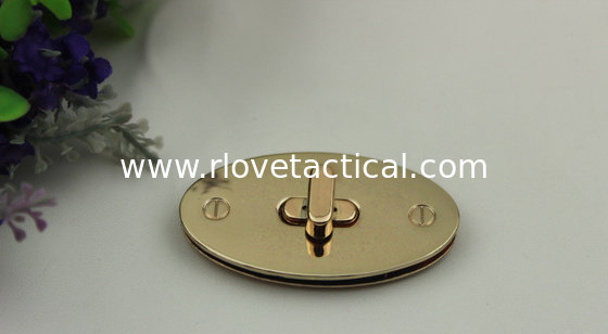 New arrival zinc alloy gold color oval type fashion wild handbag twist locks