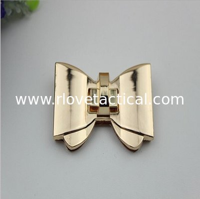 High polish gold metal bow-knot pattern zinc alloy fashion twist turn locks for purse