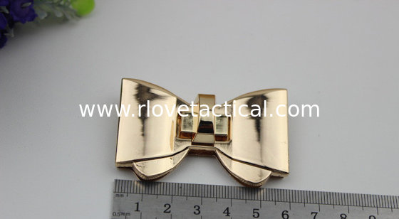 High polish gold metal bow-knot pattern zinc alloy fashion twist turn locks for purse