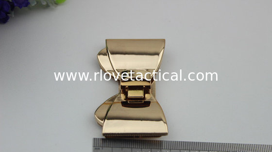 High polish gold metal bow-knot pattern zinc alloy fashion twist turn locks for purse