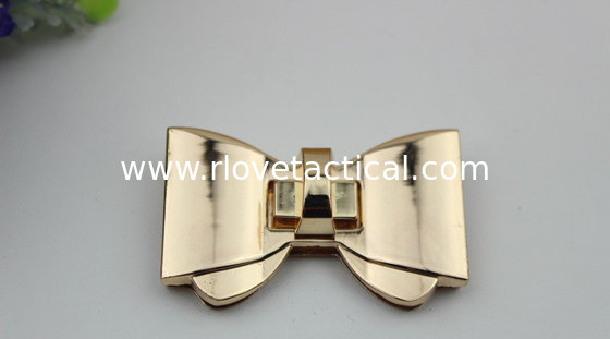 High polish gold metal bow-knot pattern zinc alloy fashion twist turn locks for purse