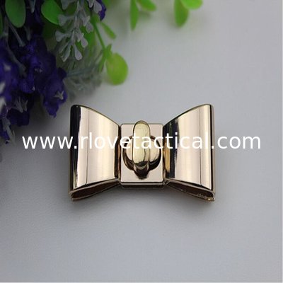 Hanging plating zinc alloy fashion gold metal bow-knot pattern small purse turn locks