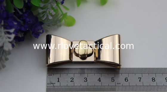 Hanging plating zinc alloy fashion gold metal bow-knot pattern small purse turn locks