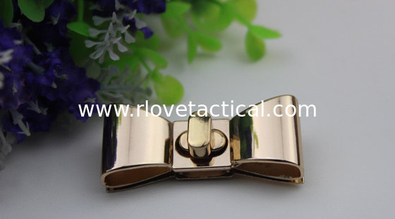 Hanging plating zinc alloy fashion gold metal bow-knot pattern small purse turn locks