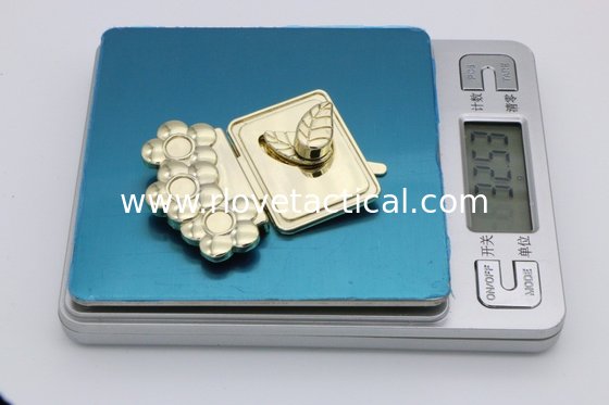 Best selling high end plating light gold leaf shape metal turn locks for handbag