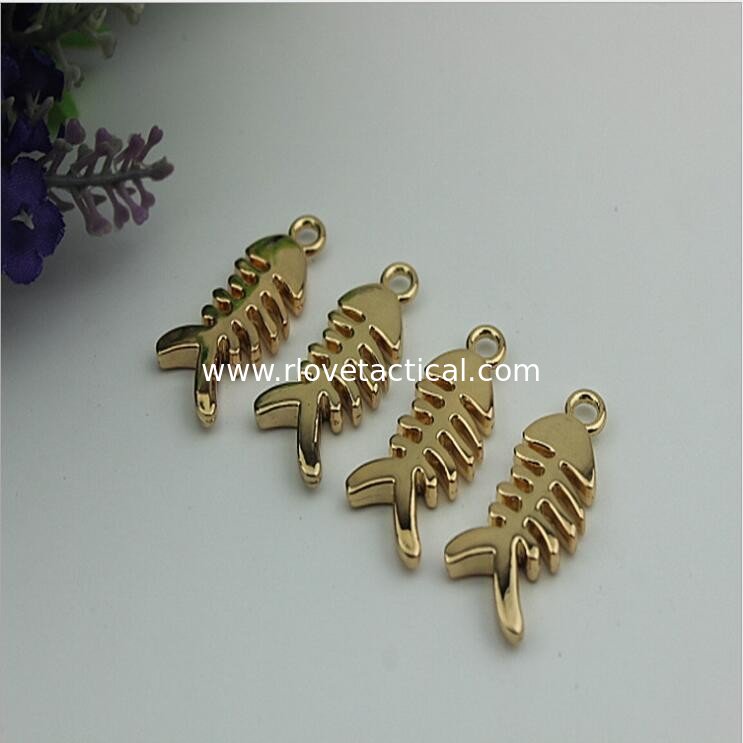Small light gold fish bones pattern zinc alloy metal handbag logo label tags for sales