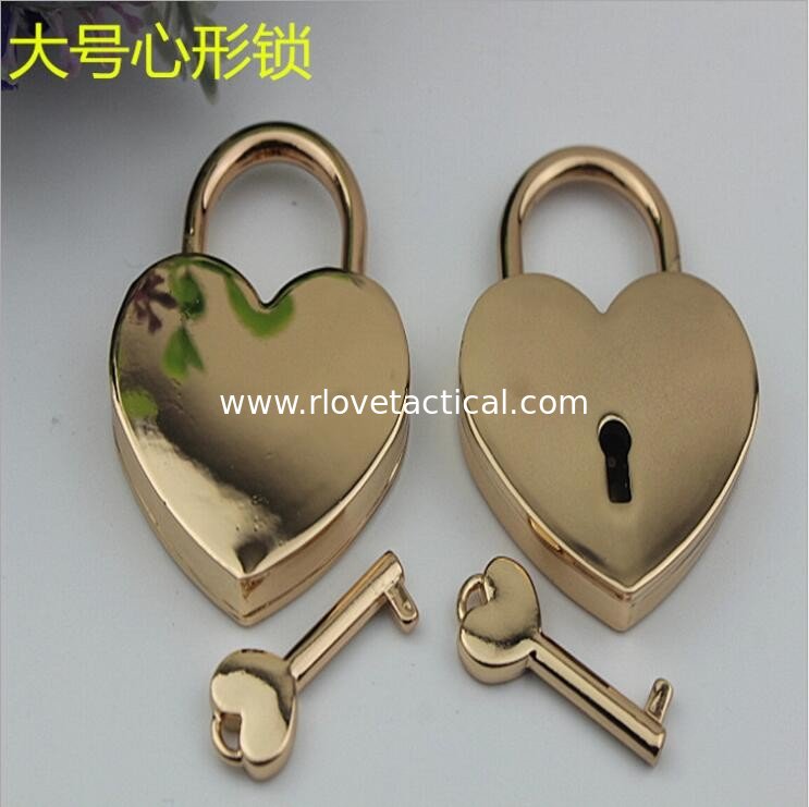 Fashion hardware handbag light gold decorative zinc alloy hanging heart shaped concentric lock for sales