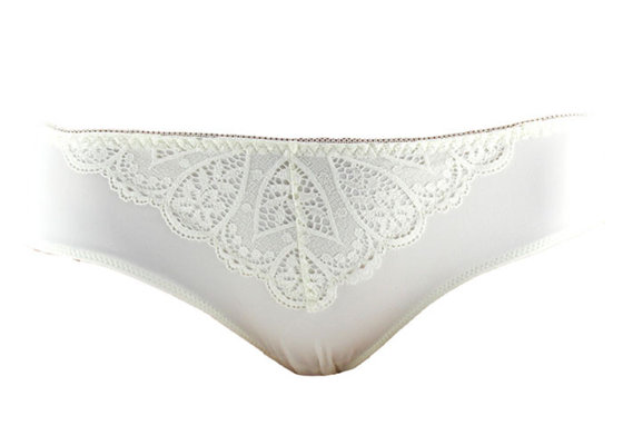 Blanc laiteux de jolis bikinis simples de filles de mode avec la jolie dentelle à l'avant