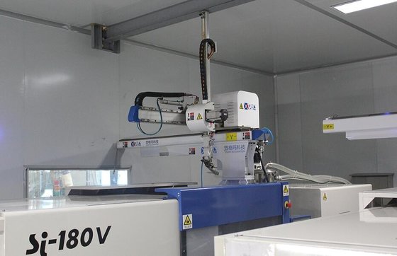 robot arm with servo driven motor assembly with injection molding machine