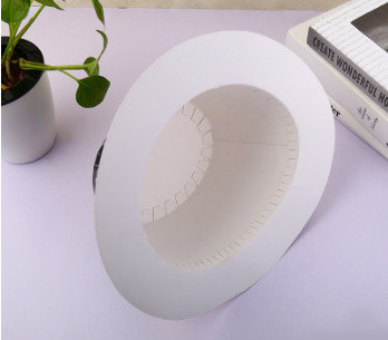 A hot-selling laser hat. New Year's carnival paper hat. New Year party holiday products. New Year's birthday hat. supplier
