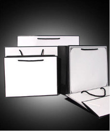 Black box horizontal white card gift paper bag for men and women. supplier