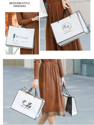 Black box horizontal white card gift paper bag for men and women. supplier