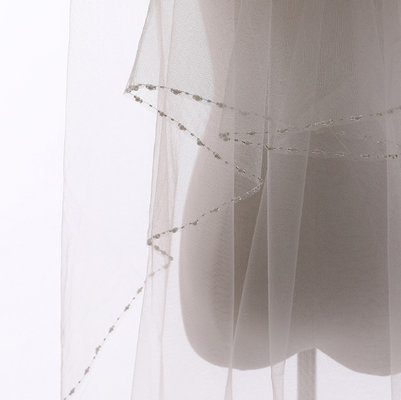 Factory direct wholesale bridal veil short double light yarn soft fingertip wedding veil with hair comb   supplier