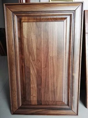 China Luxury black walnut solid wood kitchen cabinet door ,walnut raised kitchen cabinet door supplier