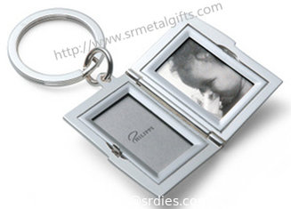 China Metal baby photo locket keychains, custom baby picture locket pendant key rings wholesale, supplier