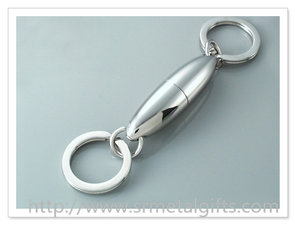 China Creative detachable bullet shape pair key chain, custom metal detachable bullet key rings, supplier