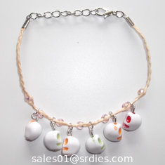 China Ceramic Skull Heads Charm String Bracelets for Girls, Wholesale Ceramic Skulls Drop Pendants Woven Bracelets supplier