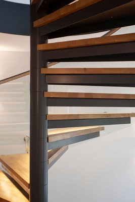 Stainless steel spiral staircase with wood steps and glass railing indoor glass spiral staircase