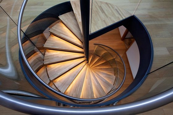 Stainless steel spiral staircase with wood steps and glass railing indoor glass spiral staircase