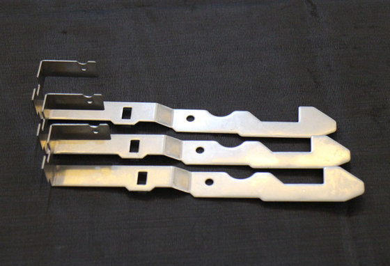 China OEM Automobile Metal Stamping Parts Lock Pawl With Aluminum Extrusion supplier