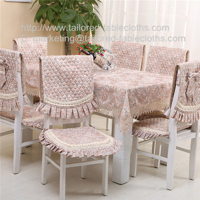 Cotton tablecloth with lace border and quilted chair cover with faux suede lining,