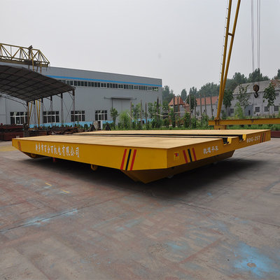 Flat transport carriage powered by busbar with steel frame on railways