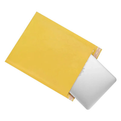 Yellow kraft paper envelope packaging bubble mailer foam shipping logistics courier bag