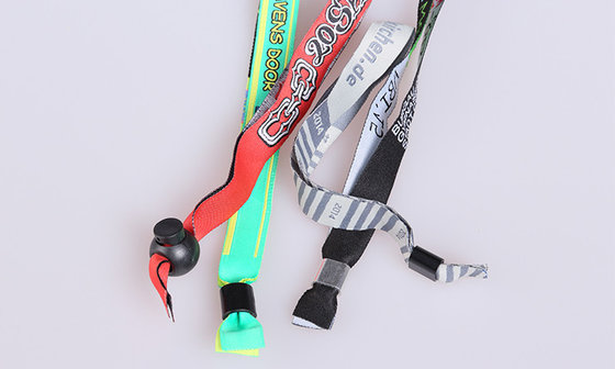 Custom woven wristband with reusable closure for events