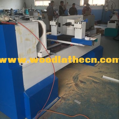 CNC controlled wood turning lathe designed for turning spindles, posts, columns and even baseball bats