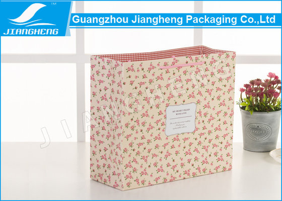 Environmentally Friendly Paper Packaging Bags Flower Pattern With Rope Handles